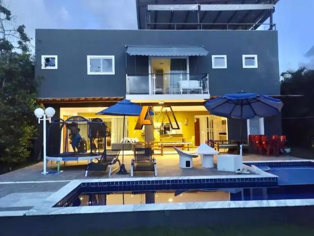 Casa / Sobrado em Condomínio para Venda em Camaçari/BA Monte Gordo 5 Quartos