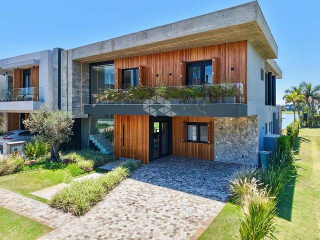Casa / Sobrado em Condomínio para Venda em Capão da Canoa/RS Centro 4 Quartos