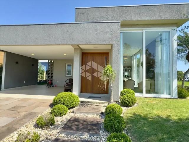Casa / Sobrado em Condomínio para Venda em Capão da Canoa/RS Centro 4 Quartos