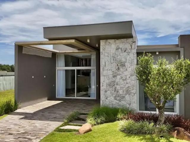 Casa / Sobrado em Condomínio para Venda em Capão da Canoa/RS Curumim 4 Quartos