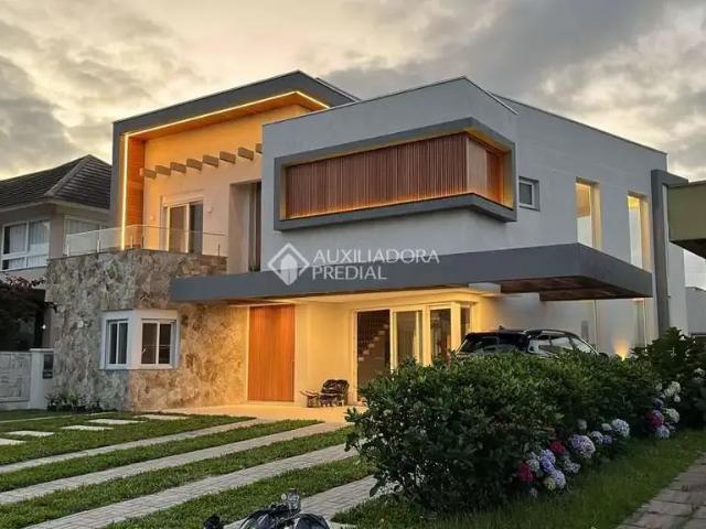 Casa / Sobrado em Condomínio para Venda em Capão da Canoa/RS Araça 4 Quartos