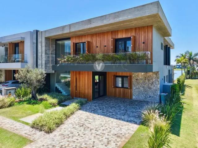 Casa / Sobrado em Condomínio para Venda em Capão da Canoa/RS Parque Antártica 4 Quartos