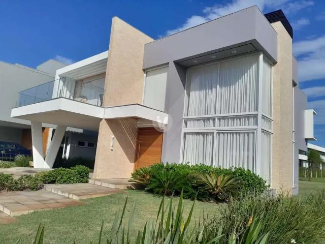 Casa / Sobrado em Condomínio para Venda em Capão da Canoa/RS Parque Antártica 4 Quartos