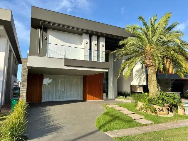 Casa / Sobrado em Condomínio para Venda em Capão da Canoa/RS Parque Antártica 4 Quartos