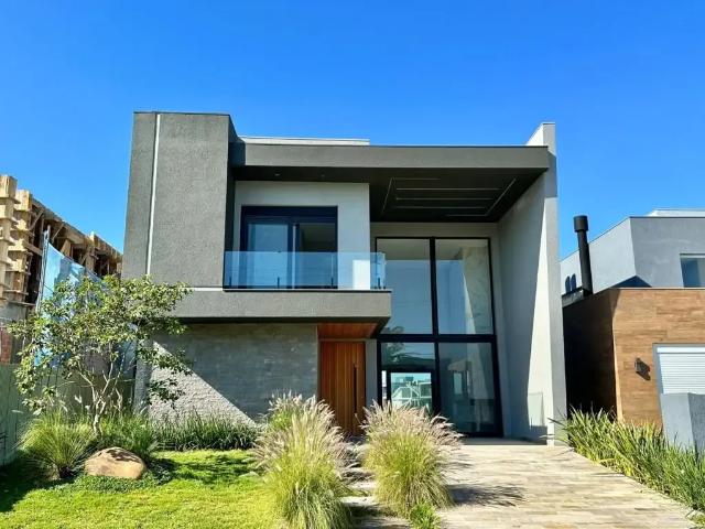 Casa / Sobrado em Condomínio para Venda em Capão da Canoa/RS Parque Antártica 4 Quartos