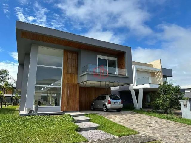 Casa / Sobrado em Condomínio para Venda em Capão da Canoa/RS Parque Antártica 6 Quartos