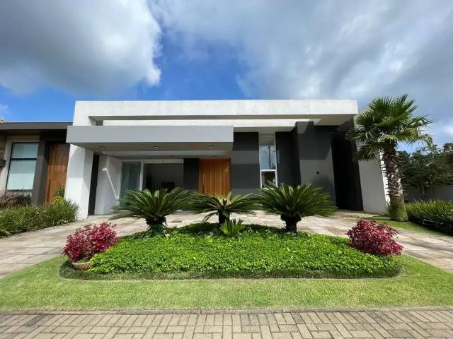 Casa / Sobrado em Condomínio para Venda em Capão da Canoa/RS Velas Da Marina 4 Quartos