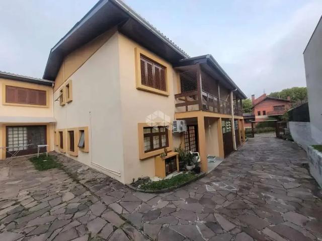 Casa / Sobrado em Condomínio para Venda em Caxias do Sul/RS Jardim América 3 Quartos