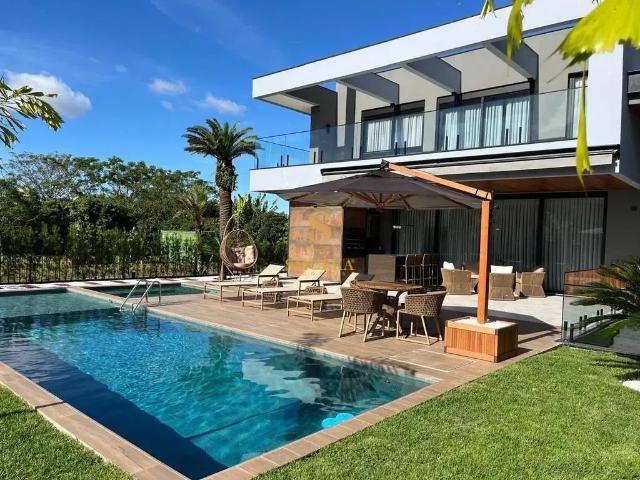 Casa / Sobrado em Condomínio para Venda em Florianópolis/SC Jurerê Internacional 4 Quartos