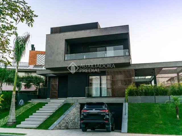 Casa / Sobrado em Condomínio para Venda em Florianópolis/SC Rio Tavares 5 Quartos