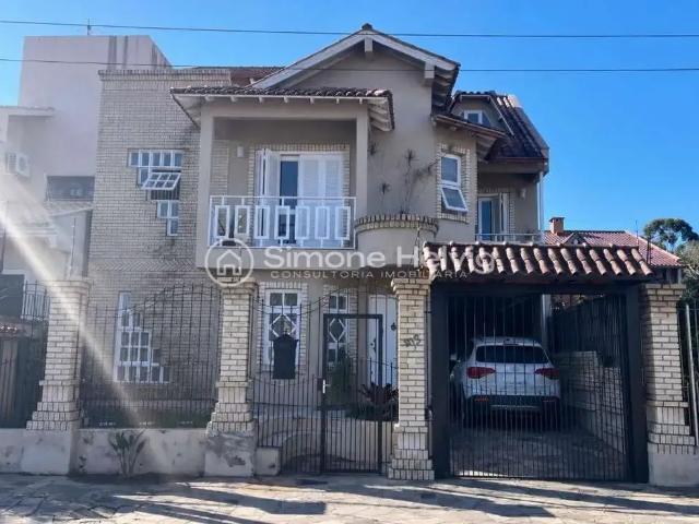 Casa / Sobrado em Condomínio para Venda em Guaíba/RS Parque 35 4 Quartos