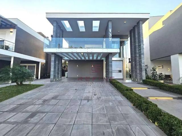 Casa / Sobrado em Condomínio para Venda em Gravataí/RS Alphaville 4 Quartos