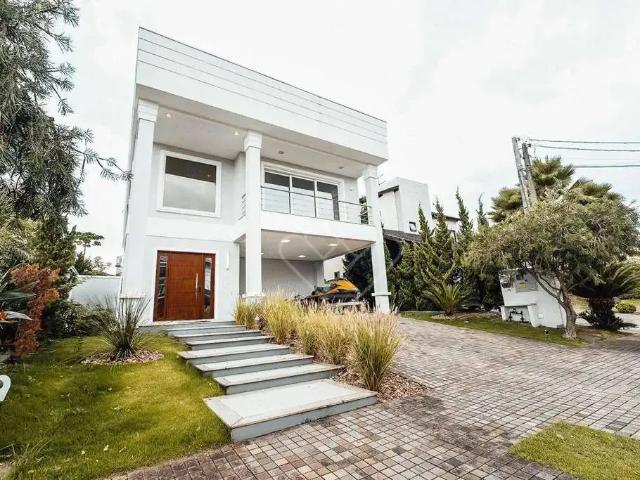 Casa / Sobrado em Condomínio para Venda em Gravataí/RS Alphaville 4 Quartos