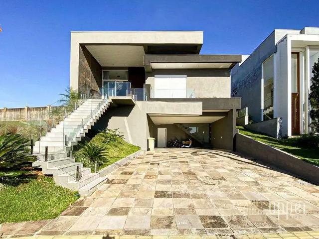 Casa / Sobrado em Condomínio para Venda em Gravataí/RS Alphaville 4 Quartos
