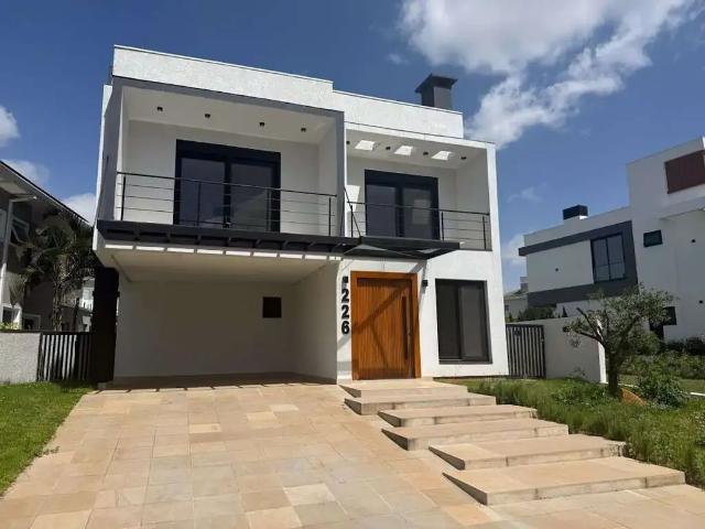 Casa / Sobrado em Condomínio para Venda em Gravataí/RS Alphaville 5 Quartos