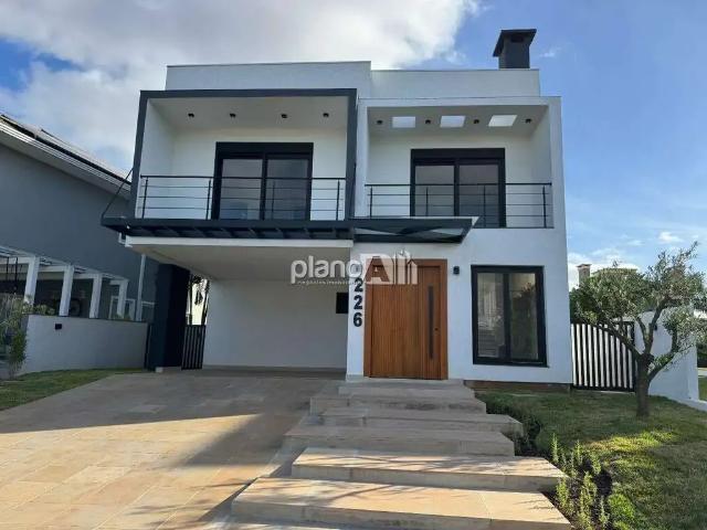 Casa / Sobrado em Condomínio para Venda em Gravataí/RS Alphaville 3 Quartos
