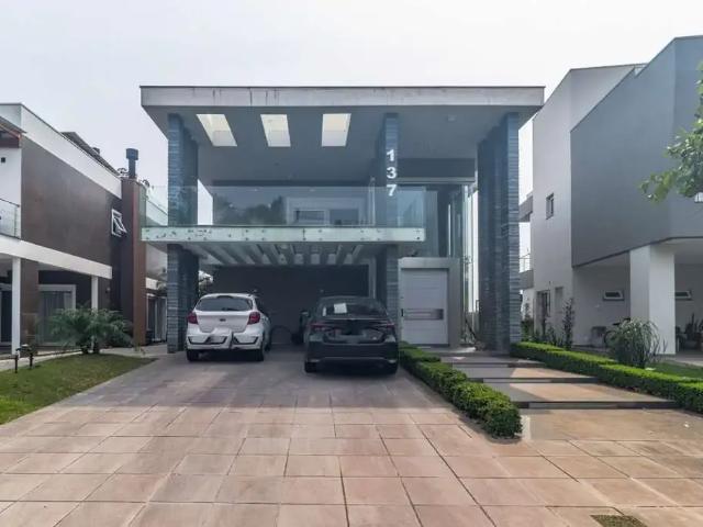 Casa / Sobrado em Condomínio para Venda em Gravataí/RS Alphaville 3 Quartos