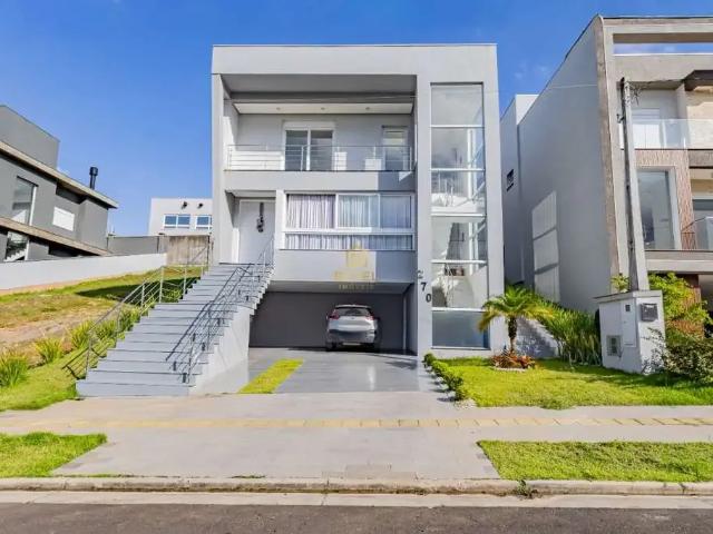 Casa / Sobrado em Condomínio para Venda em Gravataí/RS Alphaville 3 Quartos