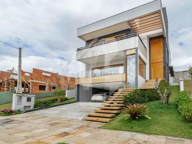 Casa / Sobrado em Condomínio para Venda em Gravataí/RS Alphaville 3 Quartos