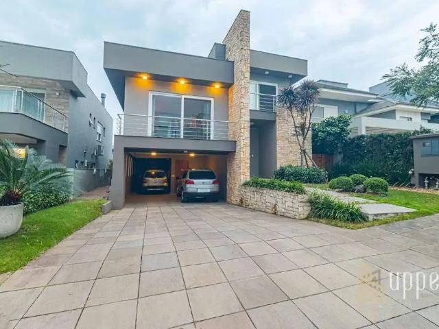 Casa / Sobrado em Condomínio para Venda em Gravataí/RS Alphaville 3 Quartos
