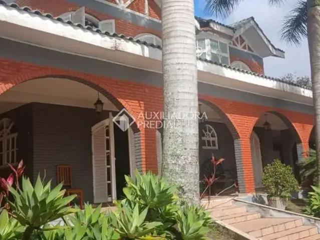 Casa / Sobrado em Condomínio para Venda em Gravataí/RS Barro Vermelho 4 Quartos