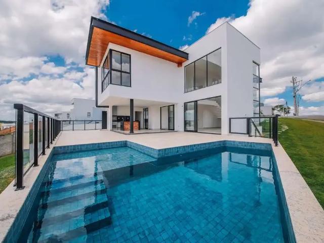 Casa / Sobrado em Condomínio para Venda em Juiz de Fora/MG Alphaville 4 Quartos