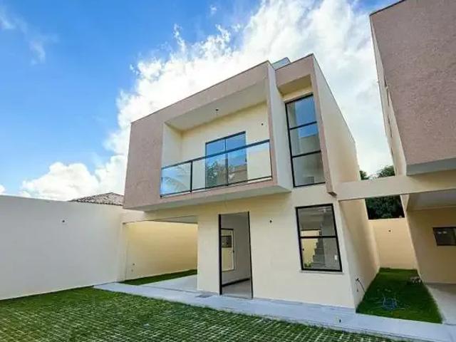 Casa / Sobrado em Condomínio para Venda em Lauro de Freitas/BA Buraquinho 3 Quartos