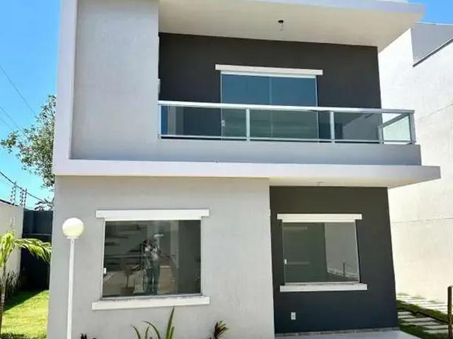 Casa / Sobrado em Condomínio para Venda em Lauro de Freitas/BA Buraquinho 4 Quartos