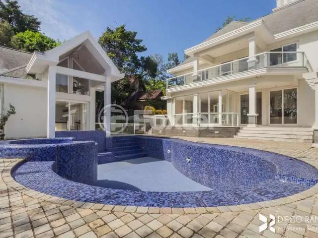 Casa / Sobrado em Condomínio para Venda em Porto Alegre/RS Cavalhada 4 Quartos