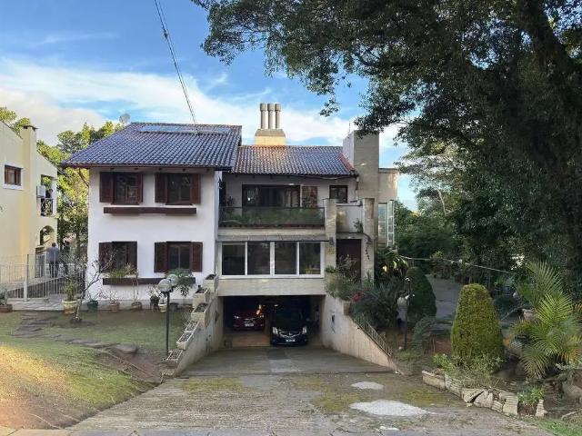 Casa / Sobrado em Condomínio para Venda em Porto Alegre/RS Cavalhada 6 Quartos