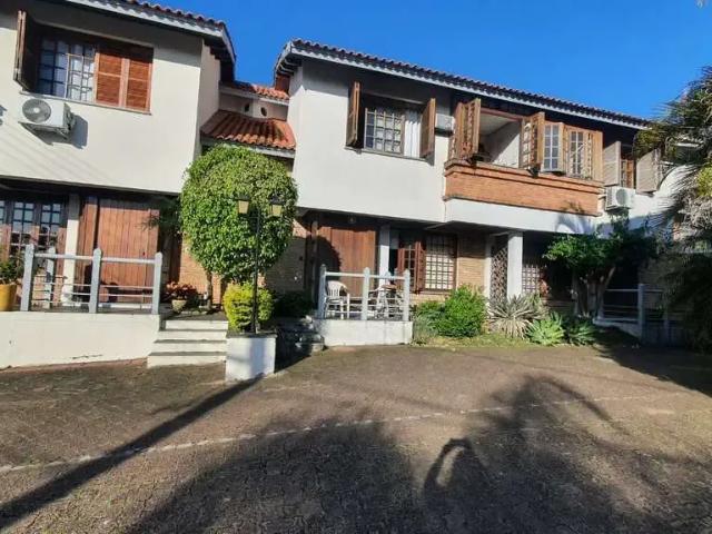 Casa / Sobrado em Condomínio para Venda em Porto Alegre/RS Cavalhada 3 Quartos