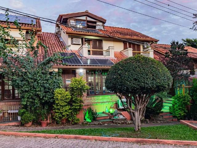 Casa / Sobrado em Condomínio para Venda em Porto Alegre/RS Cavalhada 3 Quartos