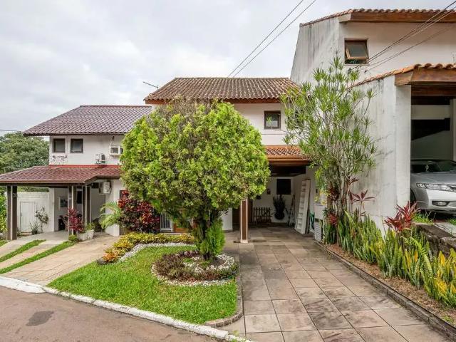 Casa / Sobrado em Condomínio para Venda em Porto Alegre/RS Cavalhada 3 Quartos