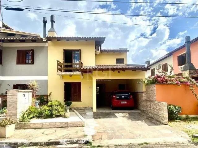 Casa / Sobrado em Condomínio para Venda em Porto Alegre/RS Guarujá 3 Quartos