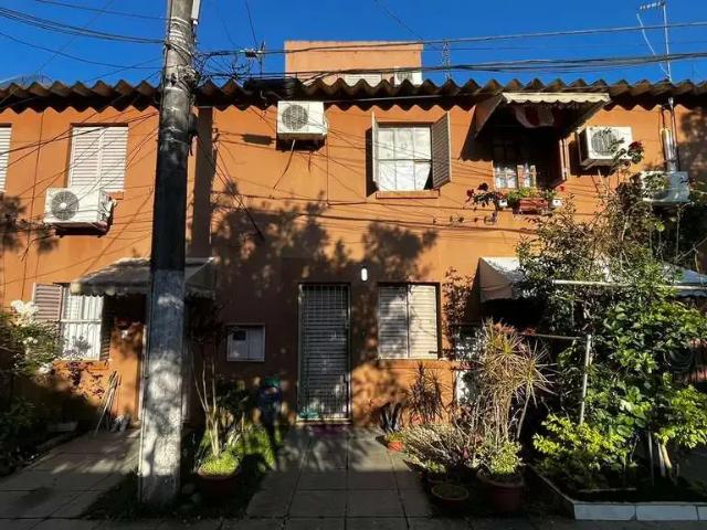 Casa / Sobrado em Condomínio para Venda em Porto Alegre/RS Guarujá 3 Quartos