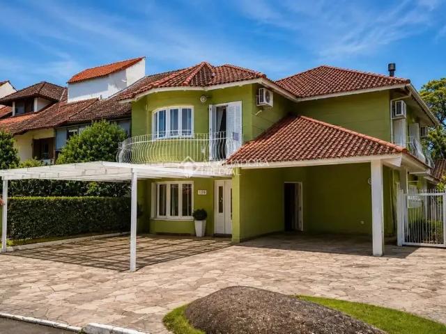 Casa / Sobrado em Condomínio para Venda em Porto Alegre/RS Guarujá 4 Quartos