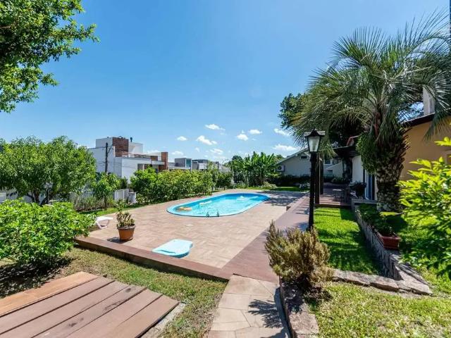Casa / Sobrado em Condomínio para Venda em Porto Alegre/RS Hípica 5 Quartos
