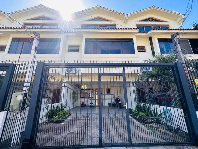 Casa / Sobrado em Condomínio para Venda em Porto Alegre/RS Hípica 3 Quartos