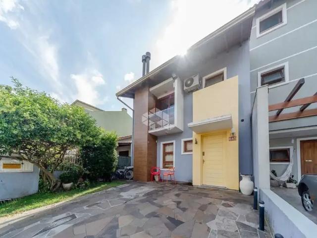 Casa / Sobrado em Condomínio para Venda em Porto Alegre/RS Hípica 3 Quartos