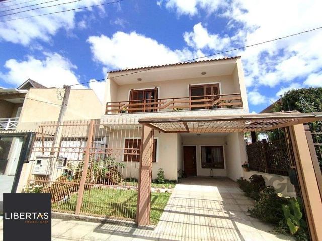 Casa / Sobrado em Condomínio para Venda em Porto Alegre/RS Hípica 3 Quartos