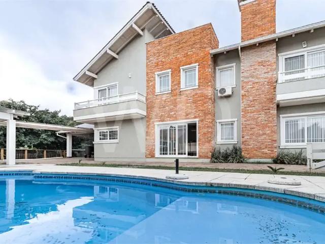 Casa / Sobrado em Condomínio para Venda em Porto Alegre/RS Hípica 3 Quartos