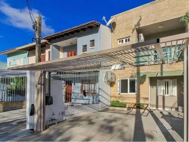 Casa / Sobrado em Condomínio para Venda em Porto Alegre/RS Hípica 3 Quartos