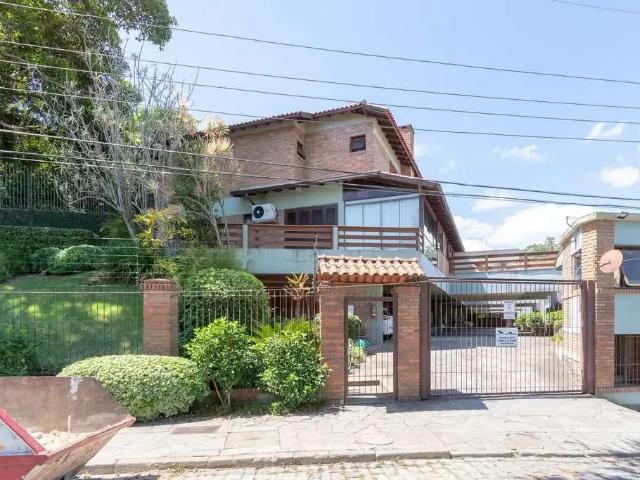 Casa / Sobrado em Condomínio para Venda em Porto Alegre/RS Jardim Isabel 3 Quartos
