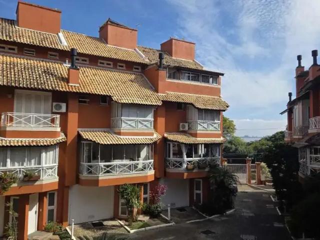 Casa / Sobrado em Condomínio para Venda em Porto Alegre/RS Vila Assunção 4 Quartos