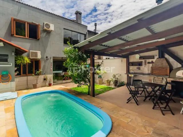 Casa / Sobrado em Condomínio para Venda em Porto Alegre/RS Vila Nova 4 Quartos