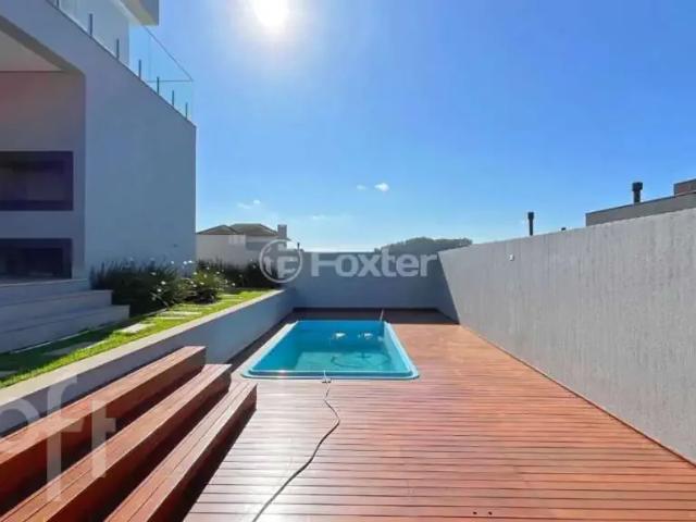 Casa / Sobrado em Condomínio para Venda em Porto Alegre/RS Vila Nova 4 Quartos