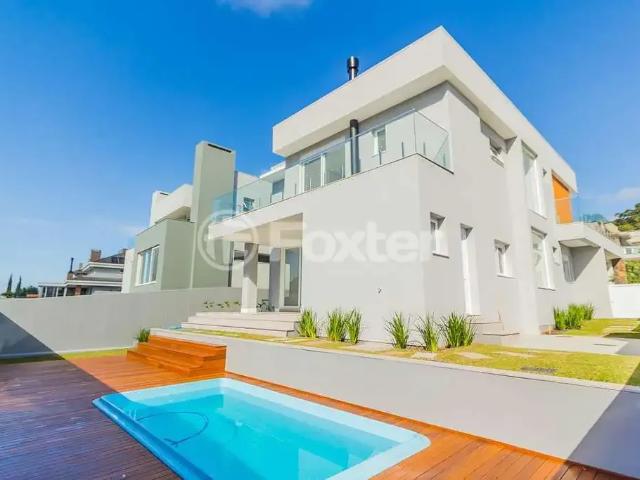 Casa / Sobrado em Condomínio para Venda em Porto Alegre/RS Vila Nova 4 Quartos