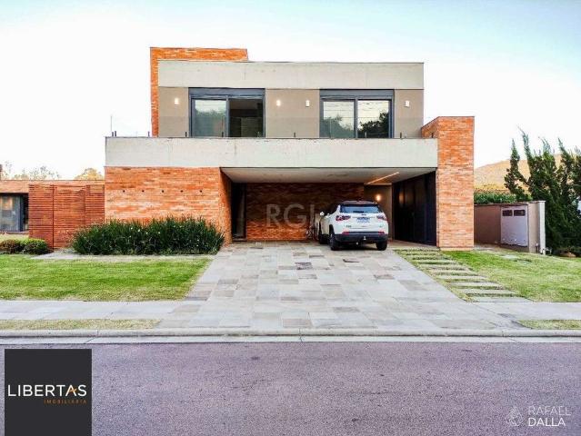 Casa / Sobrado em Condomínio para Venda em Porto Alegre/RS Vila Nova 4 Quartos