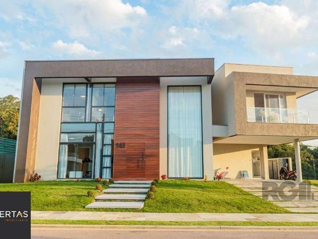 Casa / Sobrado em Condomínio para Venda em Porto Alegre/RS Vila Nova 5 Quartos