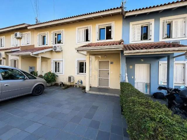 Casa / Sobrado em Condomínio para Venda em Porto Alegre/RS Vila Nova 3 Quartos